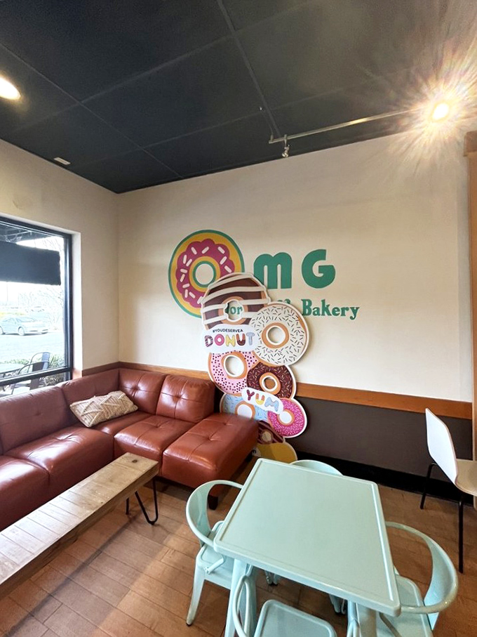 The leather couch corner offers a perfect excuse to linger longer: "I'm not having a third donut, I'm just enjoying the ambiance."