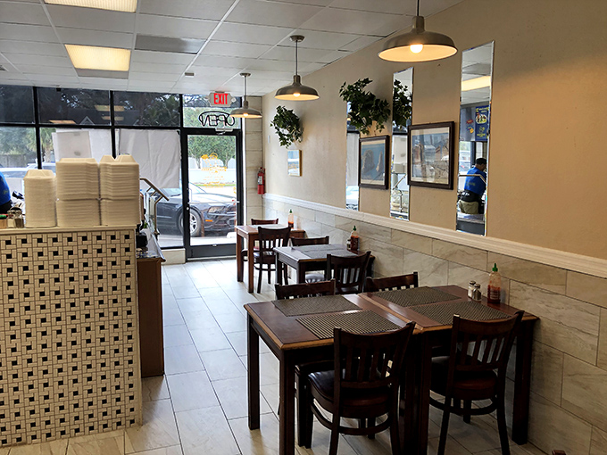 Clean lines, simple furnishings, and pendant lighting that says, "We're serious about our food, not our interior design budget."