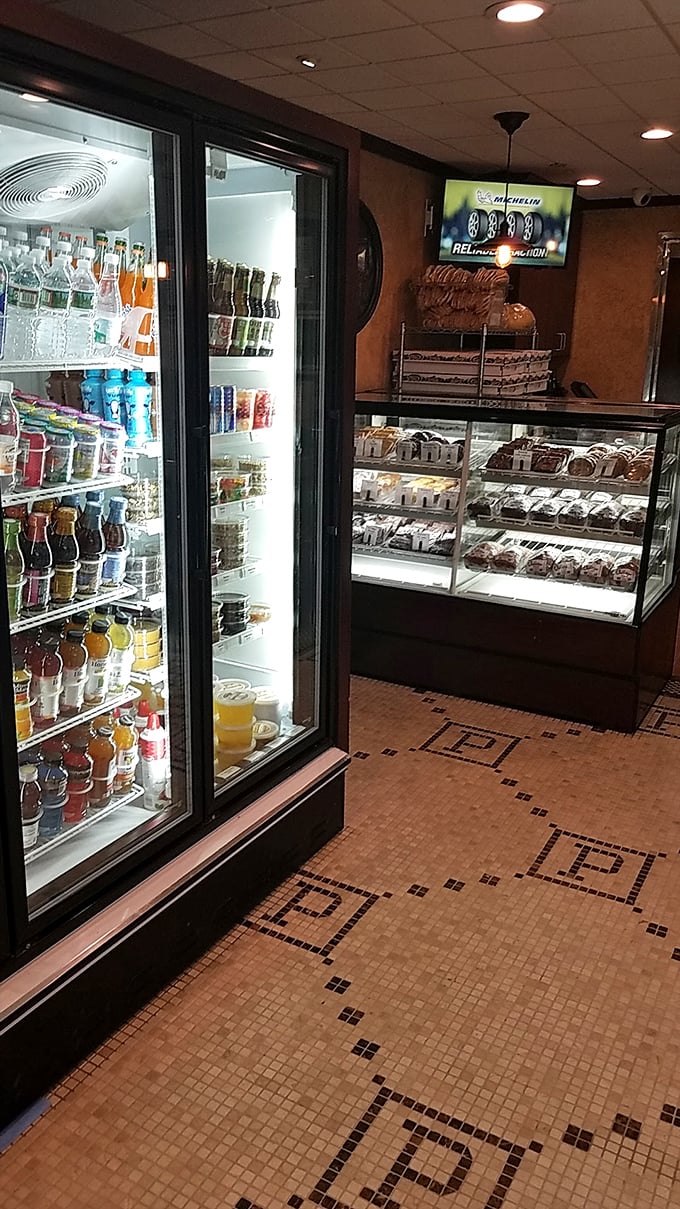 The dessert case that's responsible for countless "just five more minutes" at the end of meals. Sweet temptation in its natural habitat.