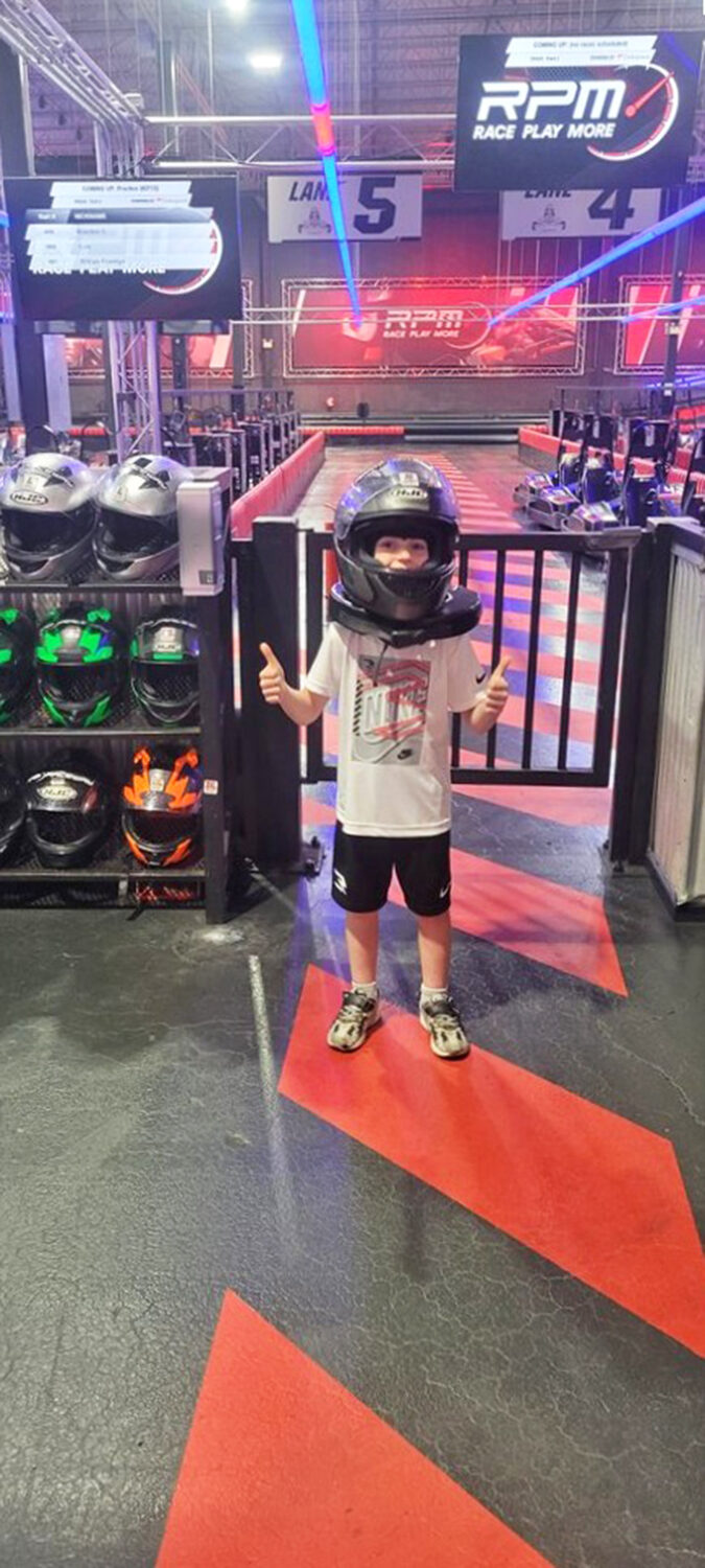 Young racers discover the thrill of competition early, those thumbs-up hiding the fact that they'll probably smoke most adults on the track.