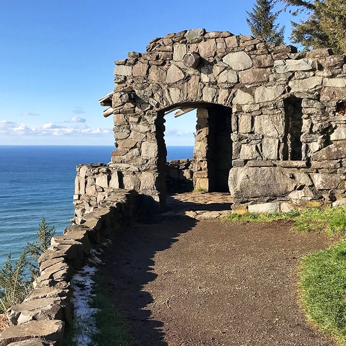 The stone shelter at Cape Perpetua was built by the CCC in the 1930s, offering travelers the world's most dramatic living room with 180-degree ocean views.