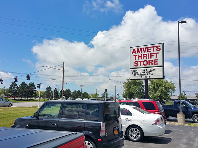 Under blue skies and fluffy clouds, the AMVETS sign announces its mission &ndash; serving veterans while serving up deals to savvy shoppers.