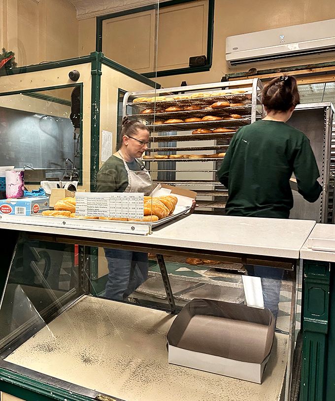 Artists at work. In a world of automation, these skilled hands create each pastry with the care of a Renaissance painter.