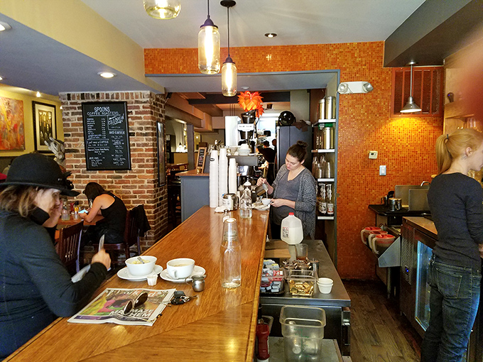 Where breakfast magic happens. The counter at Spoons offers front-row seats to the morning culinary show.