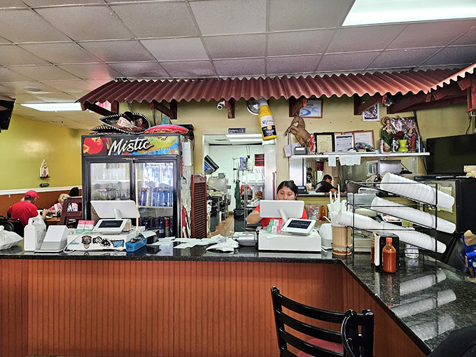 Behind the counter, culinary magicians transform simple ingredients into extraordinary meals with the efficiency of a well-rehearsed orchestra.
