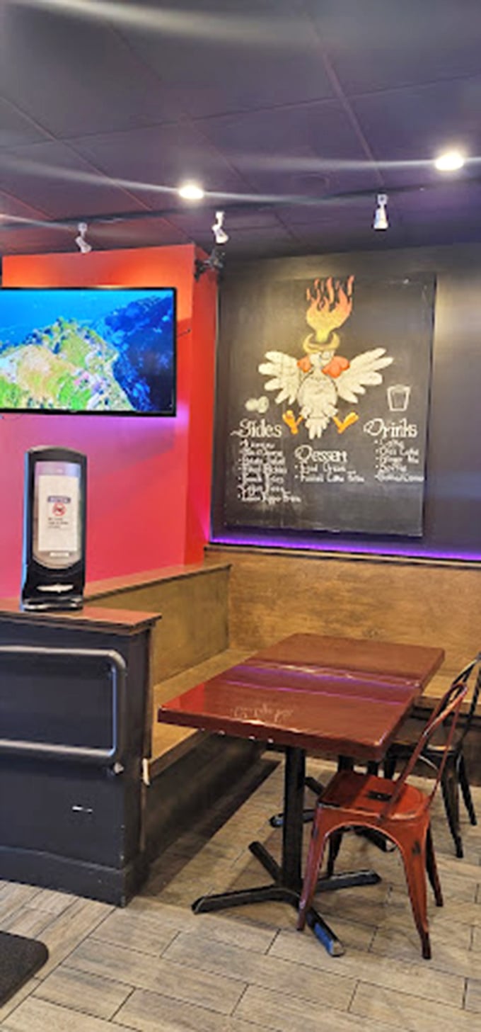 A fiery chicken mural watches over diners&mdash;part guardian, part warning of the delicious heat that awaits the brave and hungry.