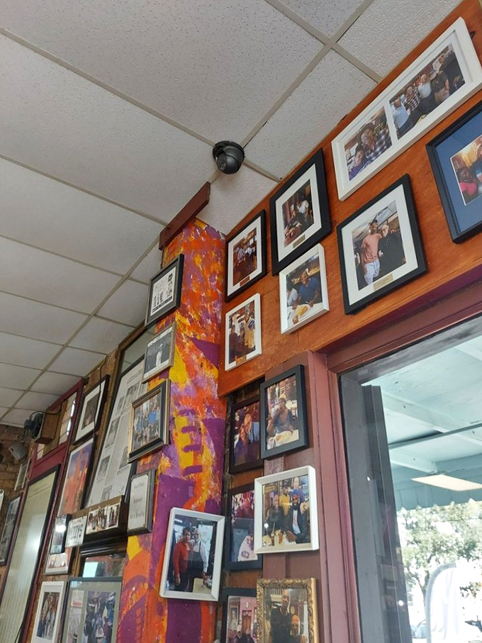Every photo on this wall represents someone who came for a meal and left with a memory. The best restaurants collect stories, not just customers.