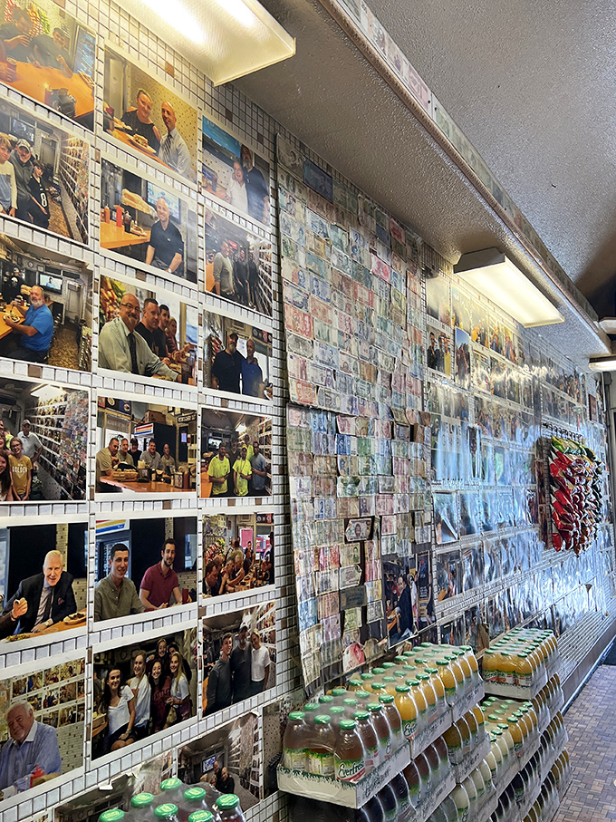 The wall of photos tells stories of loyal customers, celebrities, and memorable moments&mdash;a community scrapbook seasoned with Greek spices.
