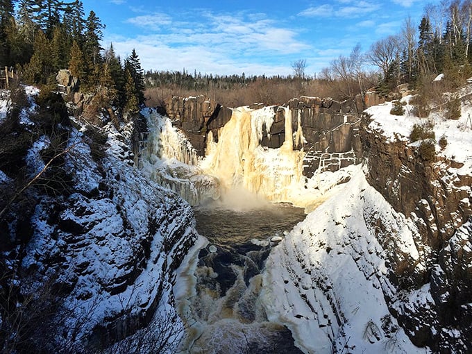 Winter transforms High Falls into a frozen cathedral of ice, proving that Minnesota's beauty doesn't hibernate&mdash;it simply changes wardrobe.
