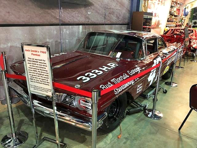 This burgundy beauty from 1960 isn't just a Pontiac&mdash;it's a time capsule with horsepower. Racing history preserved behind glass, still radiating competitive energy decades later.
