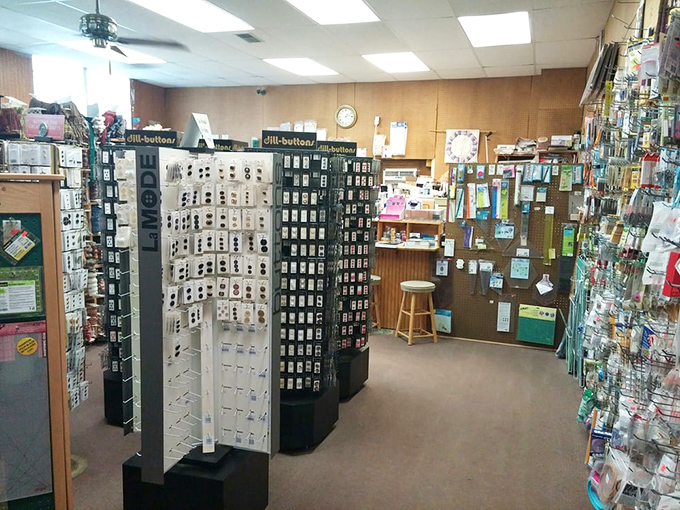 Button displays and notions stand ready like supporting actors, small but crucial elements that can make or break your sewing production.