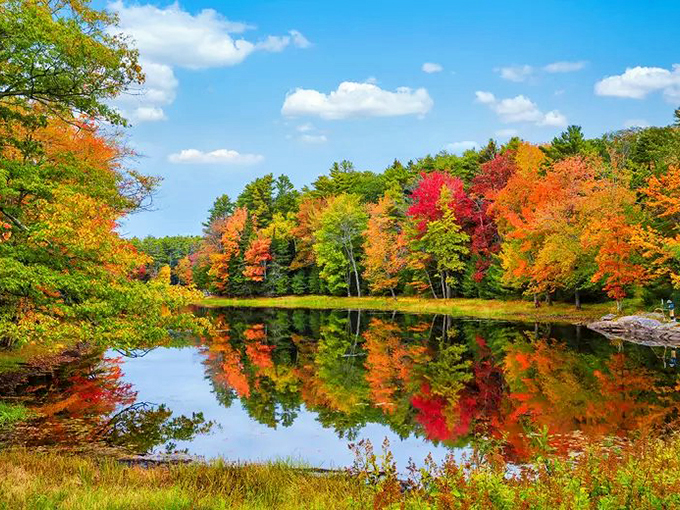 Fall paints the landscape in a palette that would make Monet jealous, with trees showing off their seasonal finery reflected in mirror-like waters.