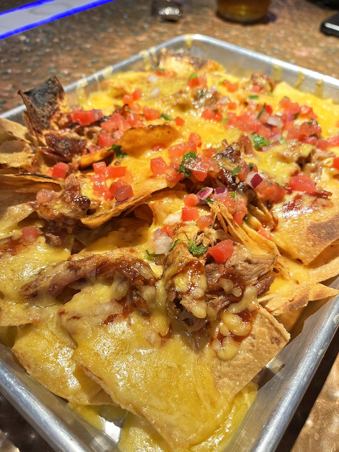 These loaded nachos don't believe in personal space&mdash;every chip is smothered in cheese, meat, and toppings. Sharing is technically optional but strongly discouraged.