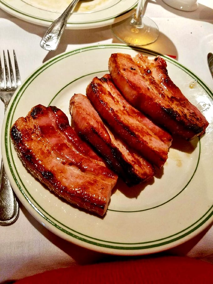 Bacon elevated from breakfast sidekick to star attraction. Thick-cut, perfectly rendered, and glistening with a sweet-savory glaze that demands your full attention.