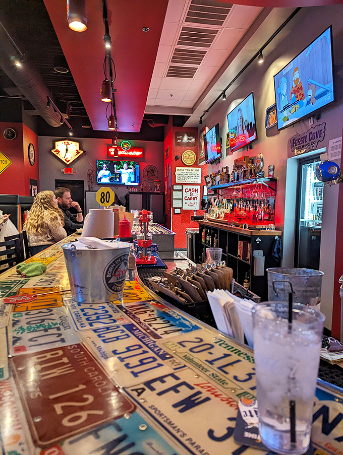 License plates line the bar like passport stamps in a well-traveled foodie's journal. Each one tells a story; none better than yours.