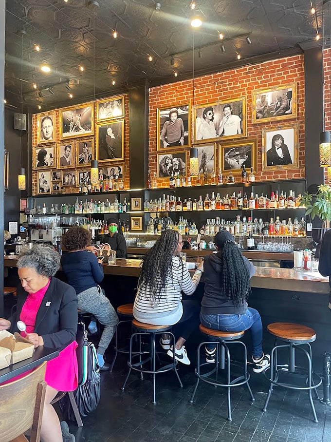 A bar that understands its supporting role in the barbecue experience, where historic photos remind us that gathering for good food is a timeless human tradition.