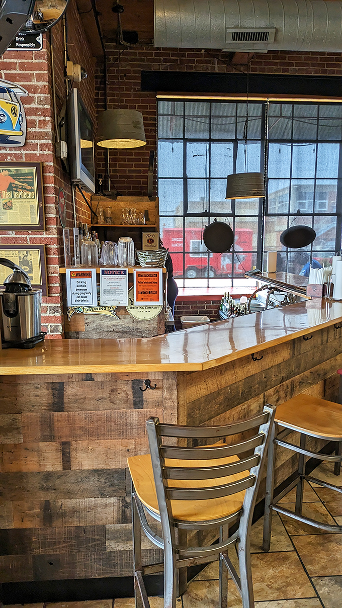 Exposed brick, wooden beams, and a bar that says "stay awhile" &ndash; the perfect backdrop for serious barbecue contemplation.