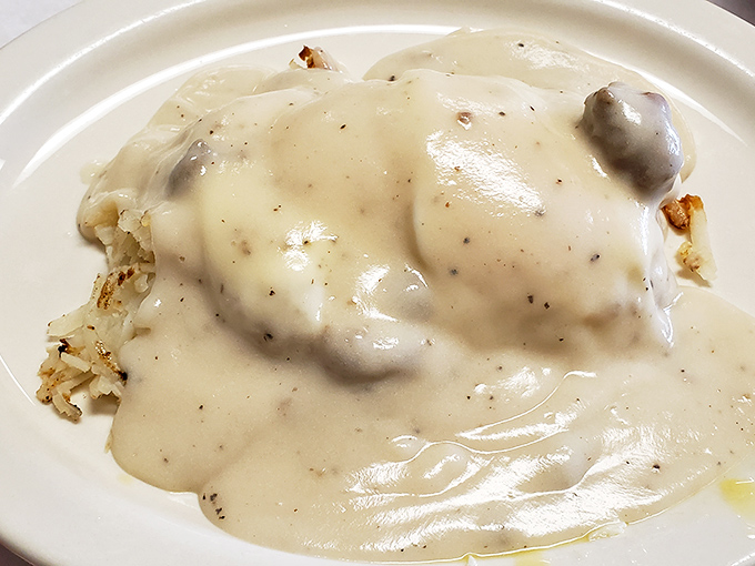 Biscuits blanketed in creamy gravy so thick you could stand a spoon in it &ndash; the dish that's launched a thousand productive farm days.