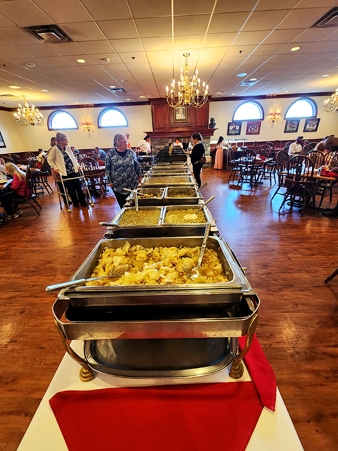 The buffet line stretches like a golden road to happiness, each steaming tray promising its own unique comfort food experience.