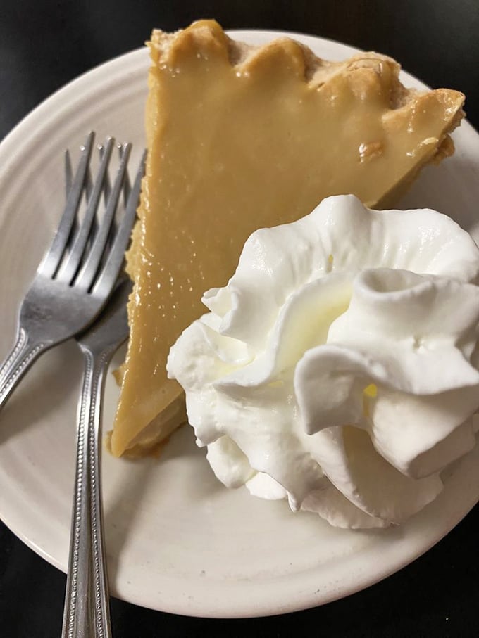 Sugar cream pie that makes you understand why Hoosiers guard this recipe like a state treasure. That dollop of whipped cream isn't optional&mdash;it's essential.