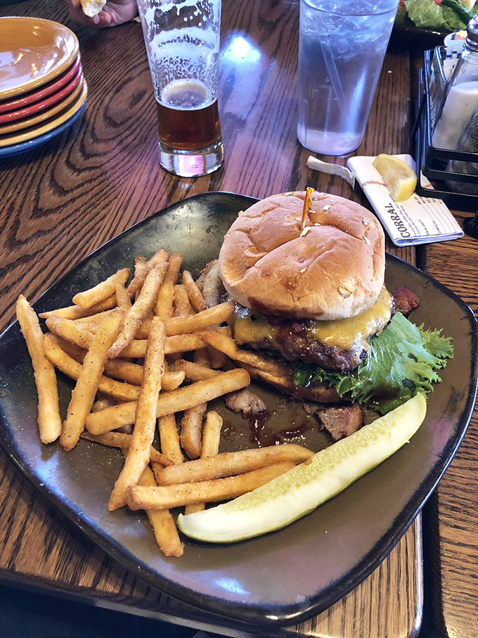 A burger that doesn't need a fancy name—just the confidence to show up with perfectly golden fries and a pickle that means business.