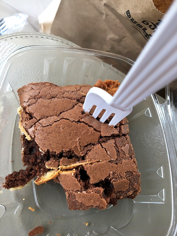 Even the desserts refuse to be ordinary&mdash;this brownie cheesecake hybrid proves Marino's excellence extends beyond the fryer.