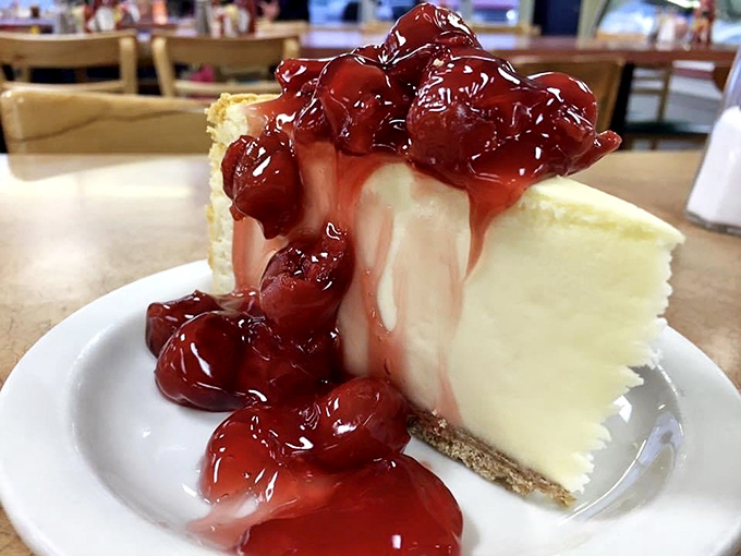 The finale worth saving room for – classic cheesecake topped with cherries that provides the perfect sweet ending to a savory seafood adventure.