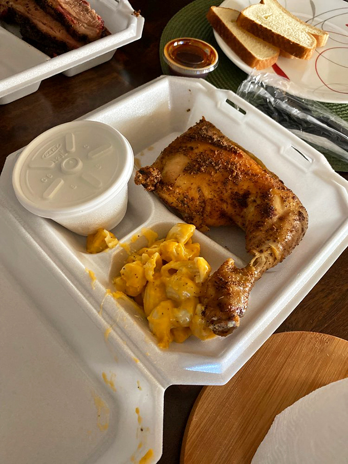 Smoky chicken quarter with that glistening, spice-crusted skin that makes you temporarily forget all other food groups exist.