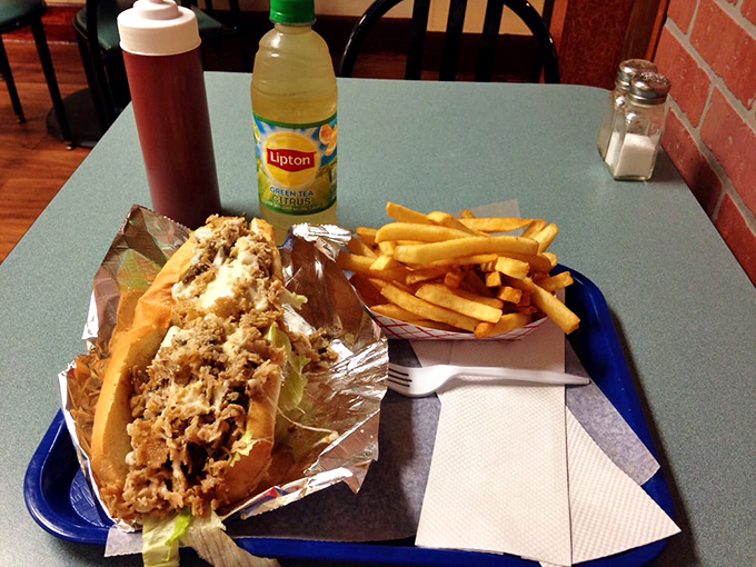 The classic combo that's launched a thousand food comas&mdash;a perfectly executed cheesesteak with fries and that essential iced tea.