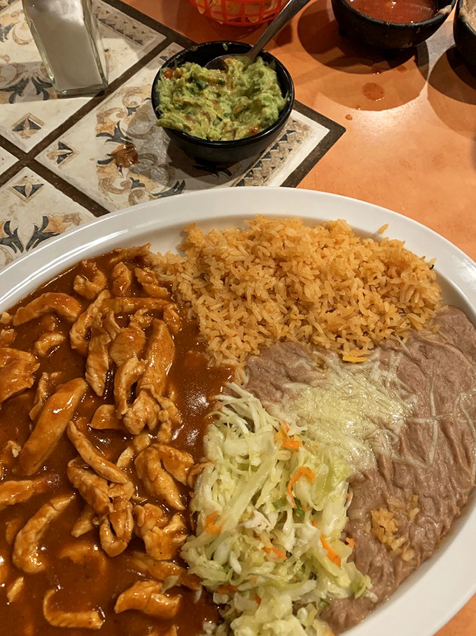 A chicken mole platter that showcases the kitchen's mastery&mdash;tender meat swimming in a sauce with more depth than most Hollywood scripts.