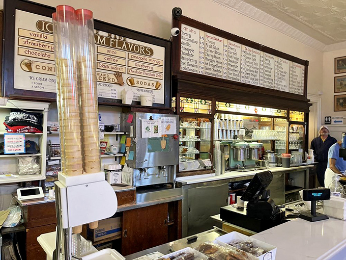 Behind the counter, the soda fountain setup remains gloriously unchanged—because when you've perfected something, why mess with it?