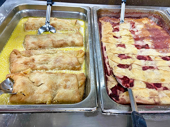 Fruit cobblers side by side &ndash; the dessert equivalent of friendly neighbors. The left one's swimming in buttery goodness while the right offers berry bliss.