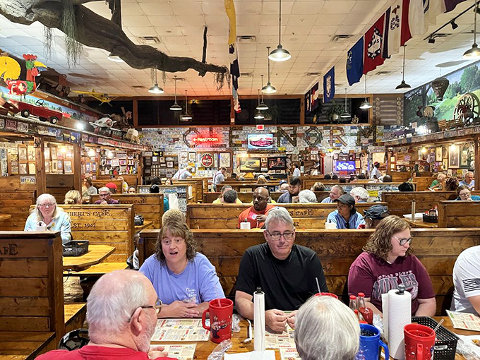 Families gather in wooden booths, creating memories over portions that will definitely become tomorrow's lunch. This isn't dining&mdash;it's an experience.