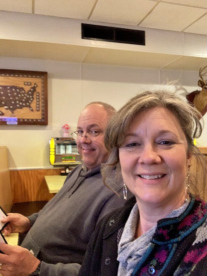 Happy diners experiencing the universal truth that good food creates better smiles than any selfie filter ever could.