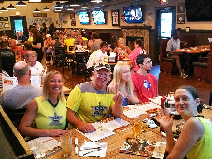 It's not just a meal, it's a social event! These happy diners prove that good food is best served with a side of laughter and friendship.