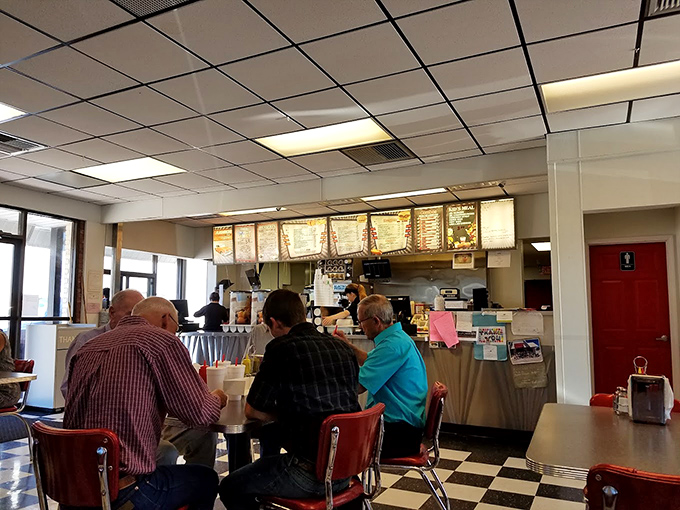 Morning regulars holding court at the counter&mdash;where local news travels faster than the internet and coffee cups are never empty.