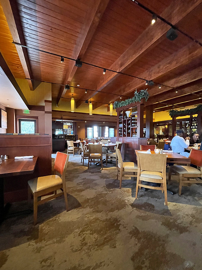 Beneath wooden beams that could tell stories, diners enjoy that perfect moment when conversation, comfort, and culinary excellence align like planets.
