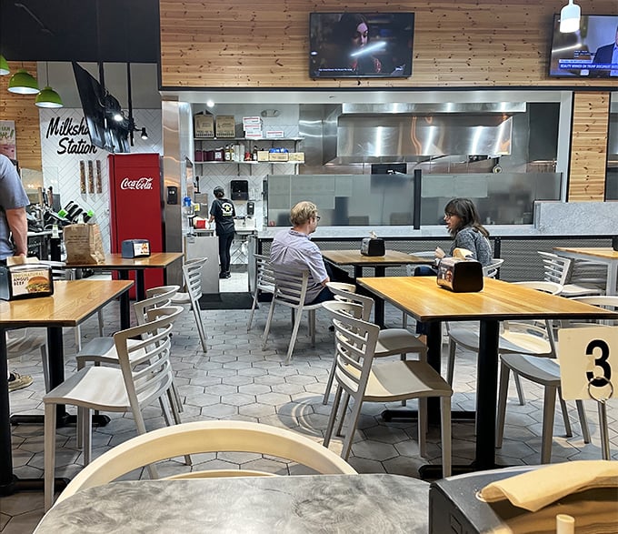BurgerFi's dining area offers the perfect backdrop for the sacred ritual of burger consumption&mdash;simple, clean, and free from distractions.