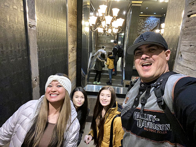 Happy diners gathered at the entrance, their smiles telling the universal story of people about to embark on a serious seafood adventure.