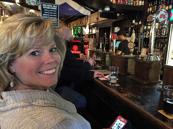 The bar at The Royal Mile isn't just where drinks are served – it's where strangers become friends over pints and shared food discoveries.