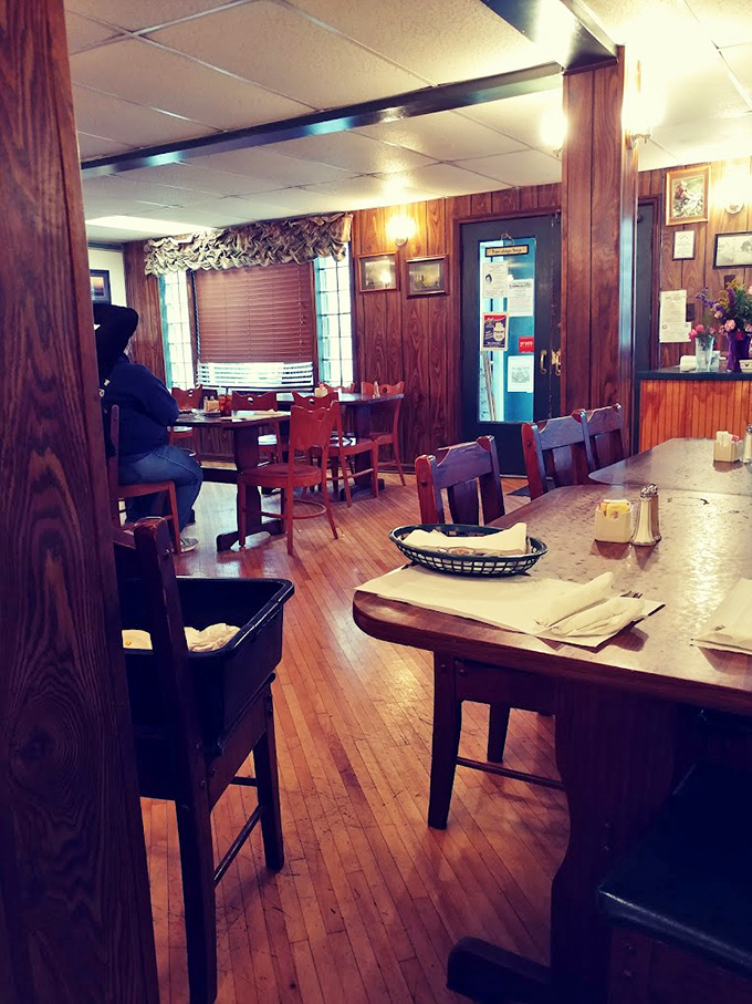 The dining area's well-worn wooden floors tell stories of generations who've come for sustenance and stayed for the community.