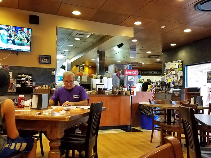 The caf&eacute; seating area: where locals gather to enjoy their spoils and silently judge anyone who leaves without trying the daily special.