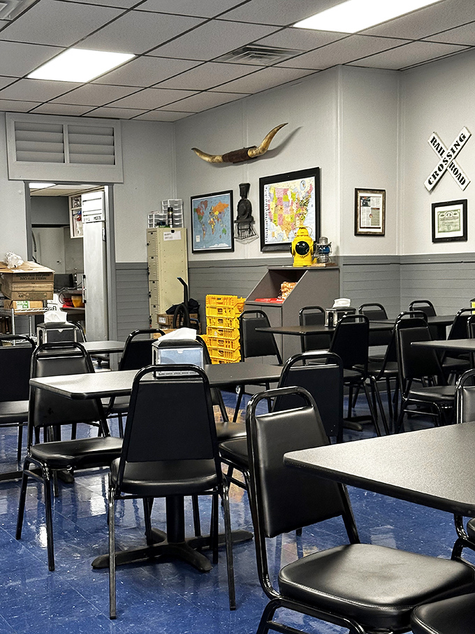 The dining area's no-nonsense charm features blue floors, simple tables, and walls adorned with bits of local history. A community gathering spot since WWI.