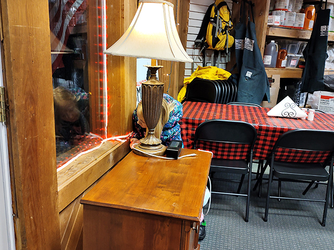 Where checkered tablecloths and table lamps create dining ambiance that feels like Sunday dinner at grandma's&mdash;if grandma were a pitmaster.