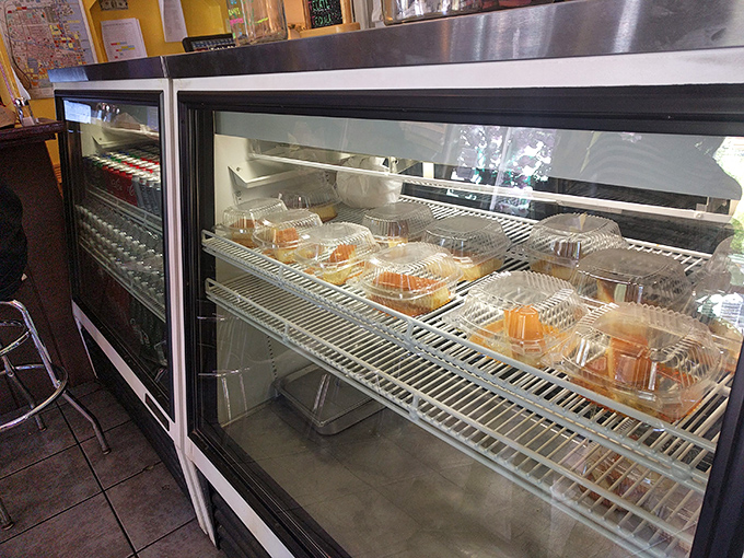 The display case isn't just storing food &ndash; it's showcasing tomorrow's happiness, neatly packaged and ready for your approval.