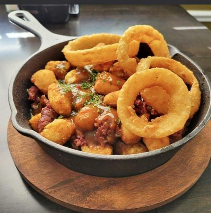 This skillet of loaded tots topped with crispy onion rings isn't just comfort food&mdash;it's a warm hug for your stomach on a cold Maryland day.