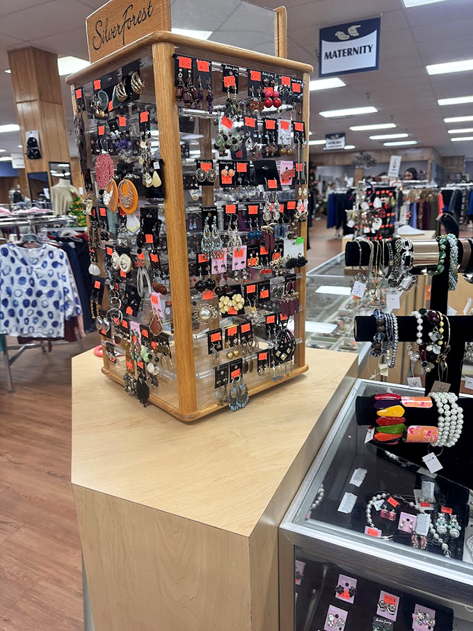 The rotating earring display, a treasure chest for accessory hunters where each pair costs less than your morning coffee.