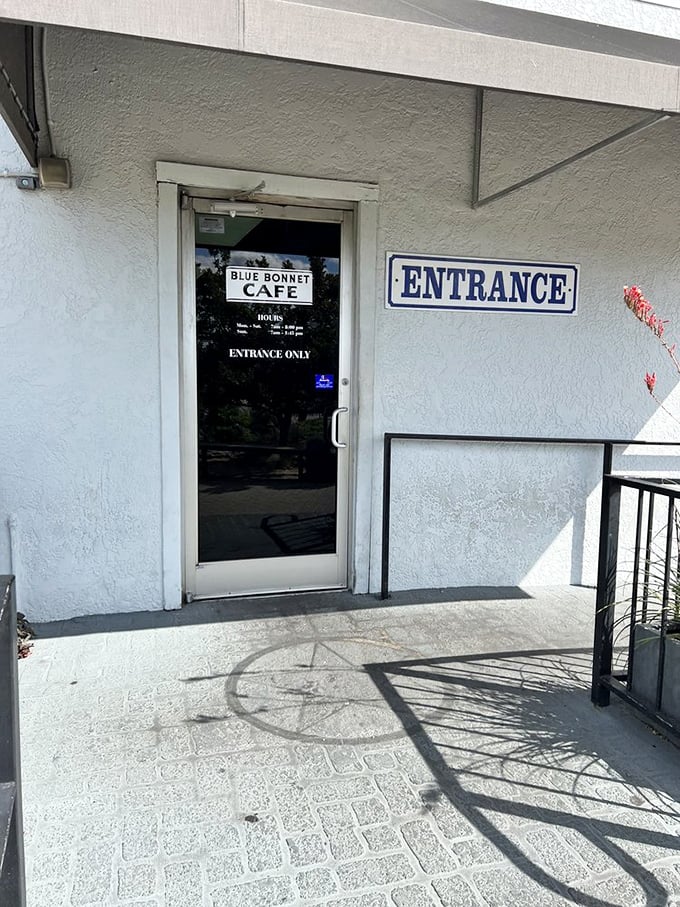 The entrance to paradise is surprisingly simple. This doorway has welcomed generations of hungry Texans seeking comfort and community.