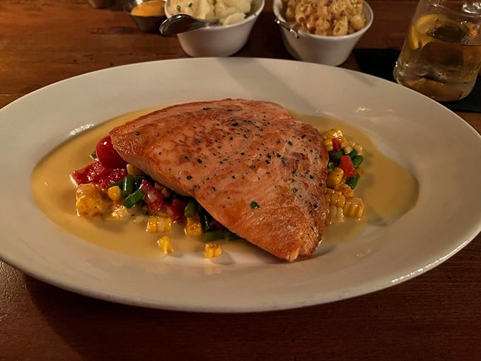 Salmon that looks like it swam all the way from the Faroe Islands just to rest on that colorful bed of corn succotash.