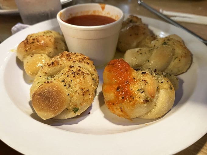Garlic knots: the unsung heroes of Italian dining. Pillowy inside, golden outside, and worth every bit of garlic breath afterward.